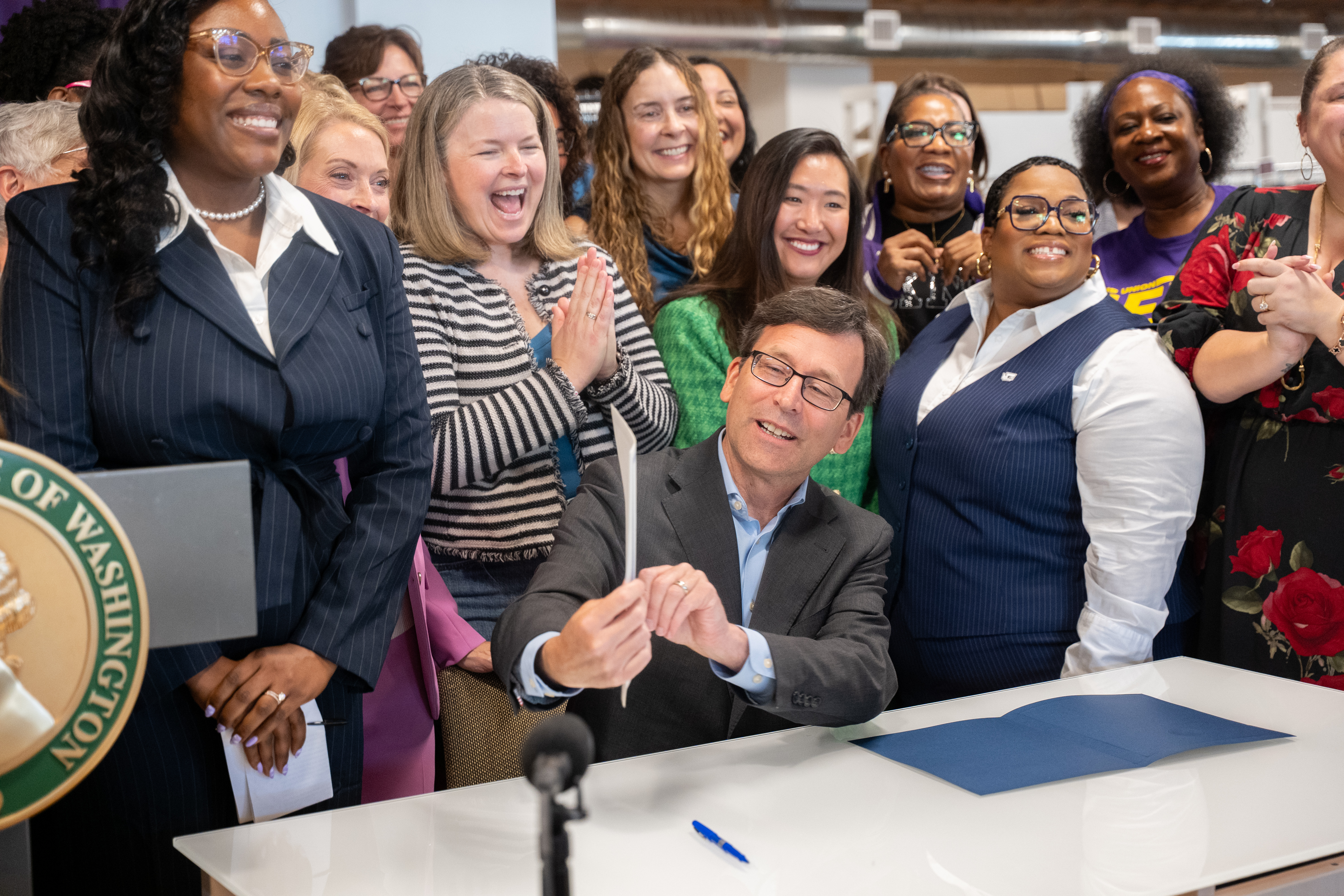 KUOW - Ferguson signs executive order to support working women ...